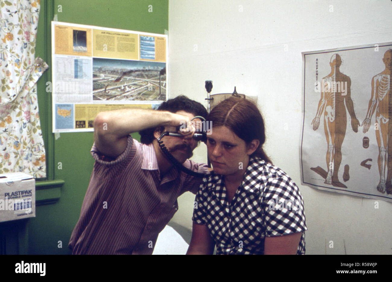 1970s ear exam hi-res stock photography and images - Alamy