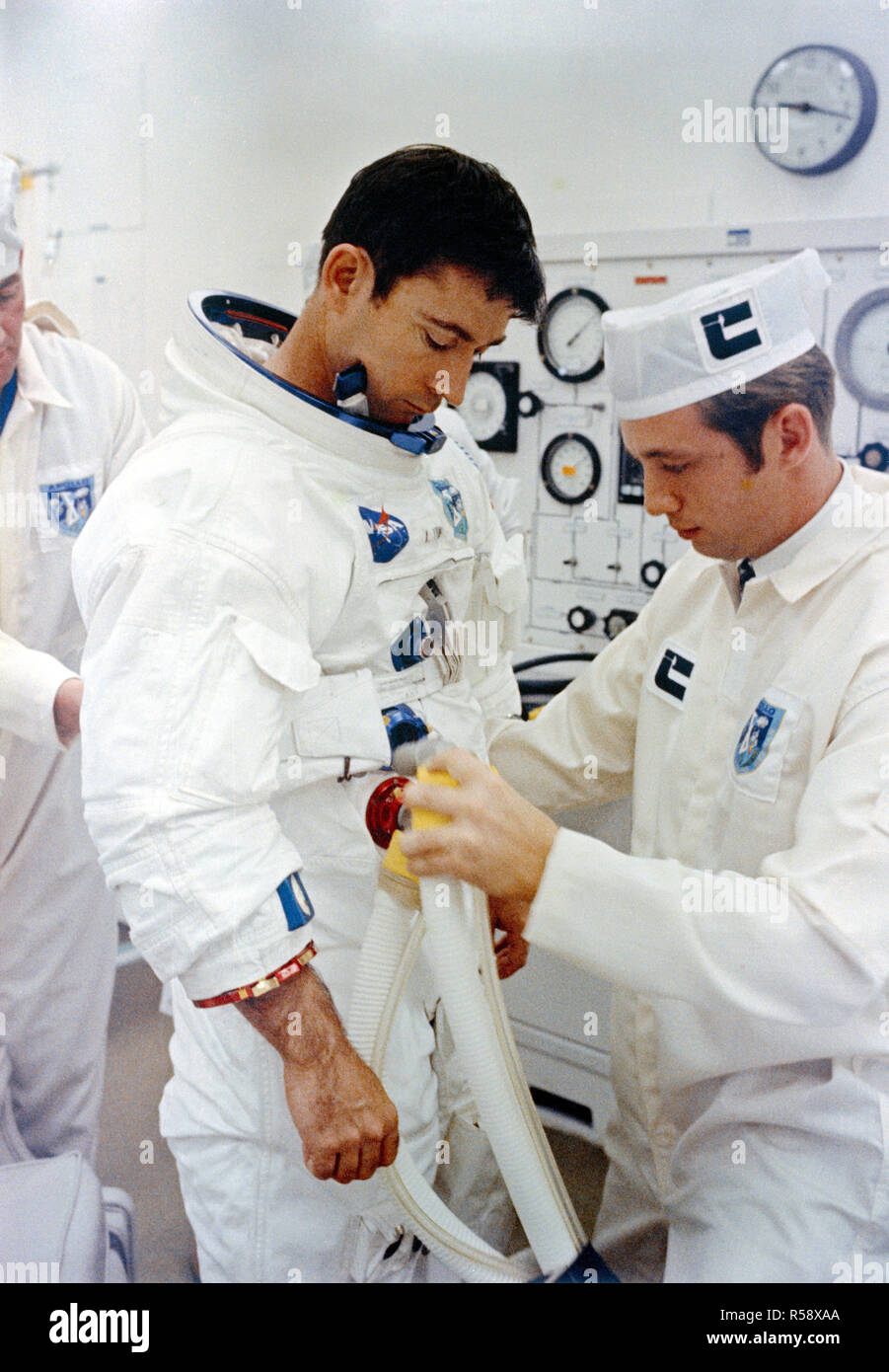 (18 May 1969) --- Technician Dave Halfhill attaches a hose from test ...