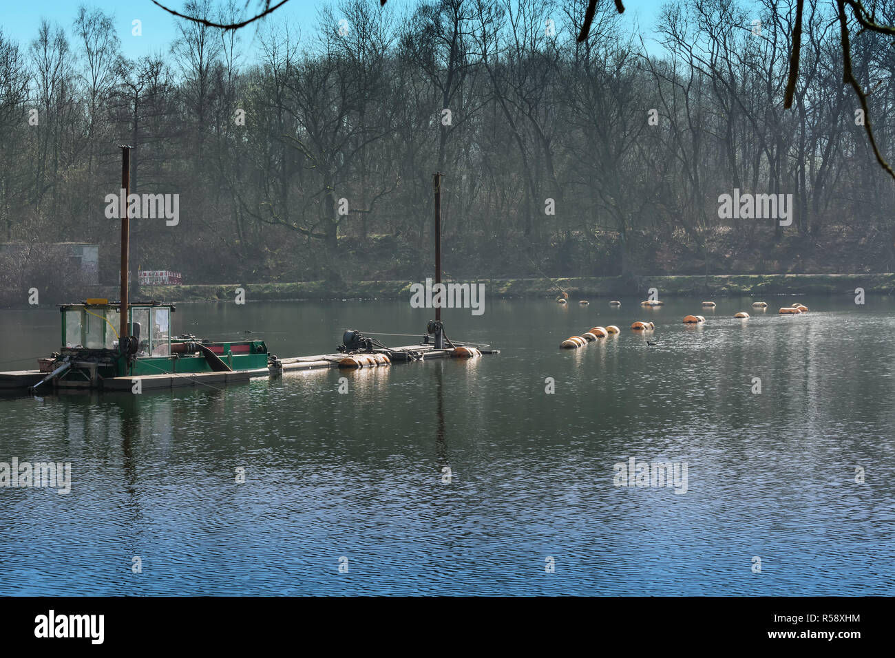 excavator ship at work Stock Photo - Alamy