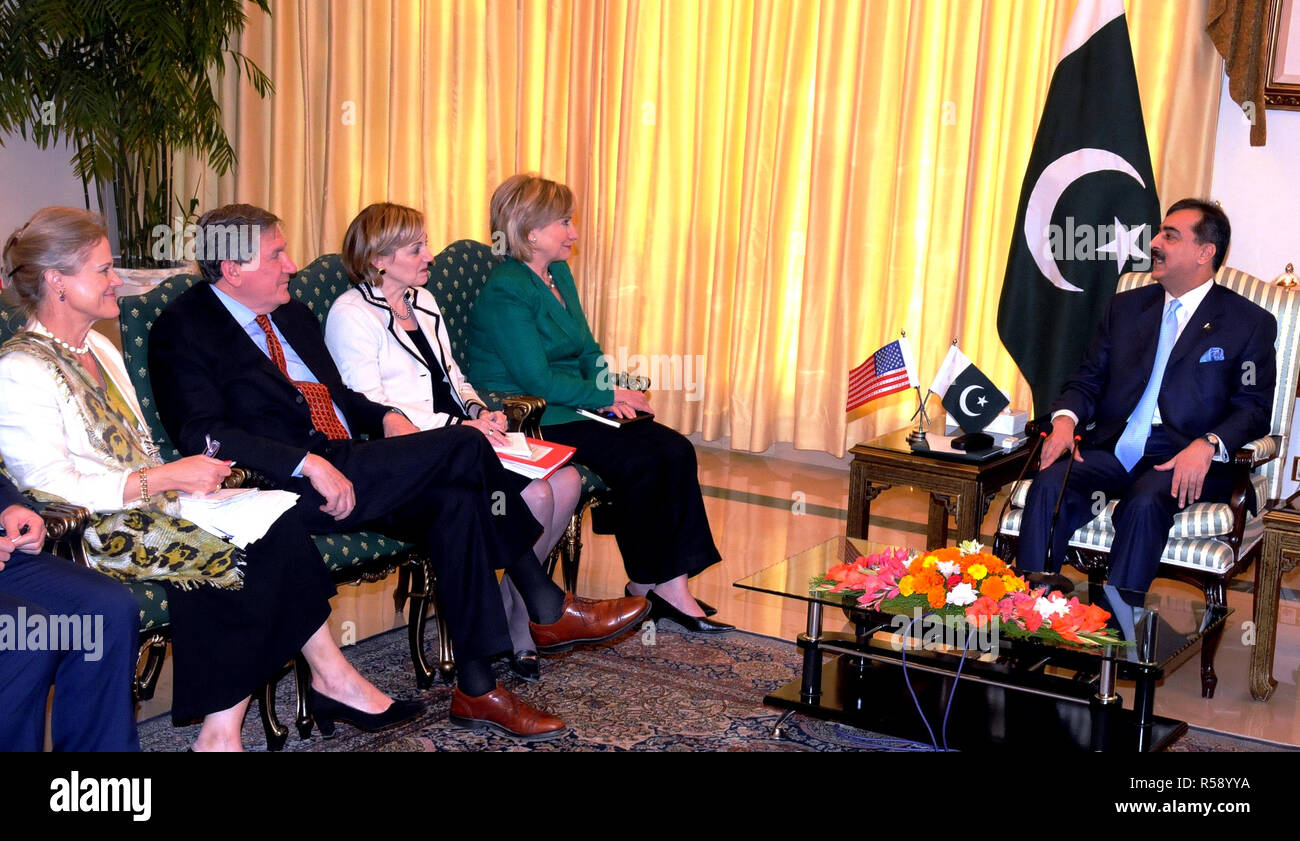 Seated from left to right are Senior Coordinator for Economic and ...