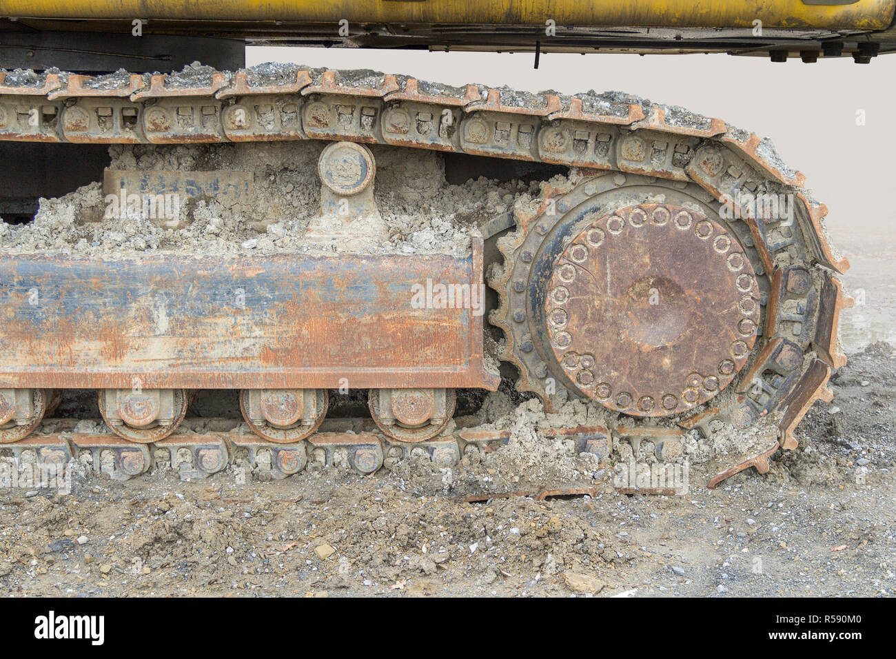 muddy crawler chain detail Stock Photo - Alamy