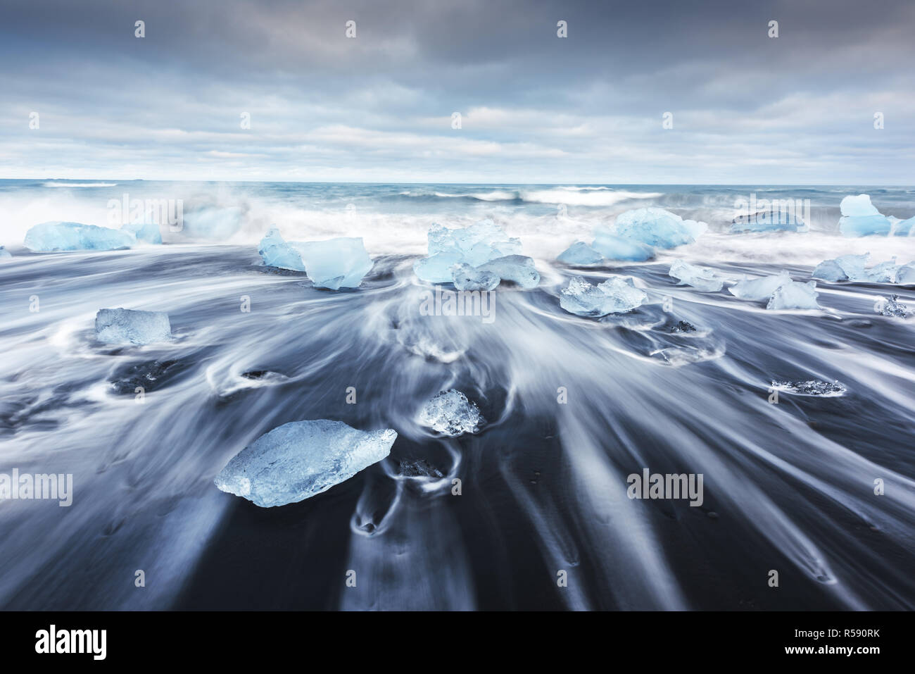 Iceberg pieces on Diamond beach near Jokulsarlon lagoon, Iceland ...
