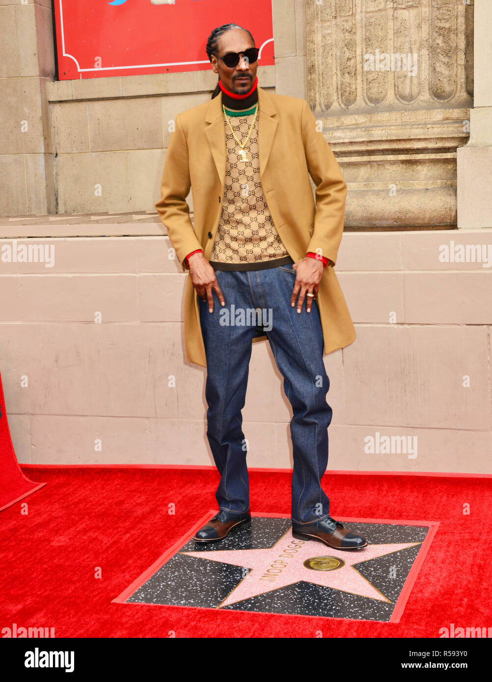 a Snoop Dog Star 024 honored with a star on The Hollywood Walk Of Fame ...
