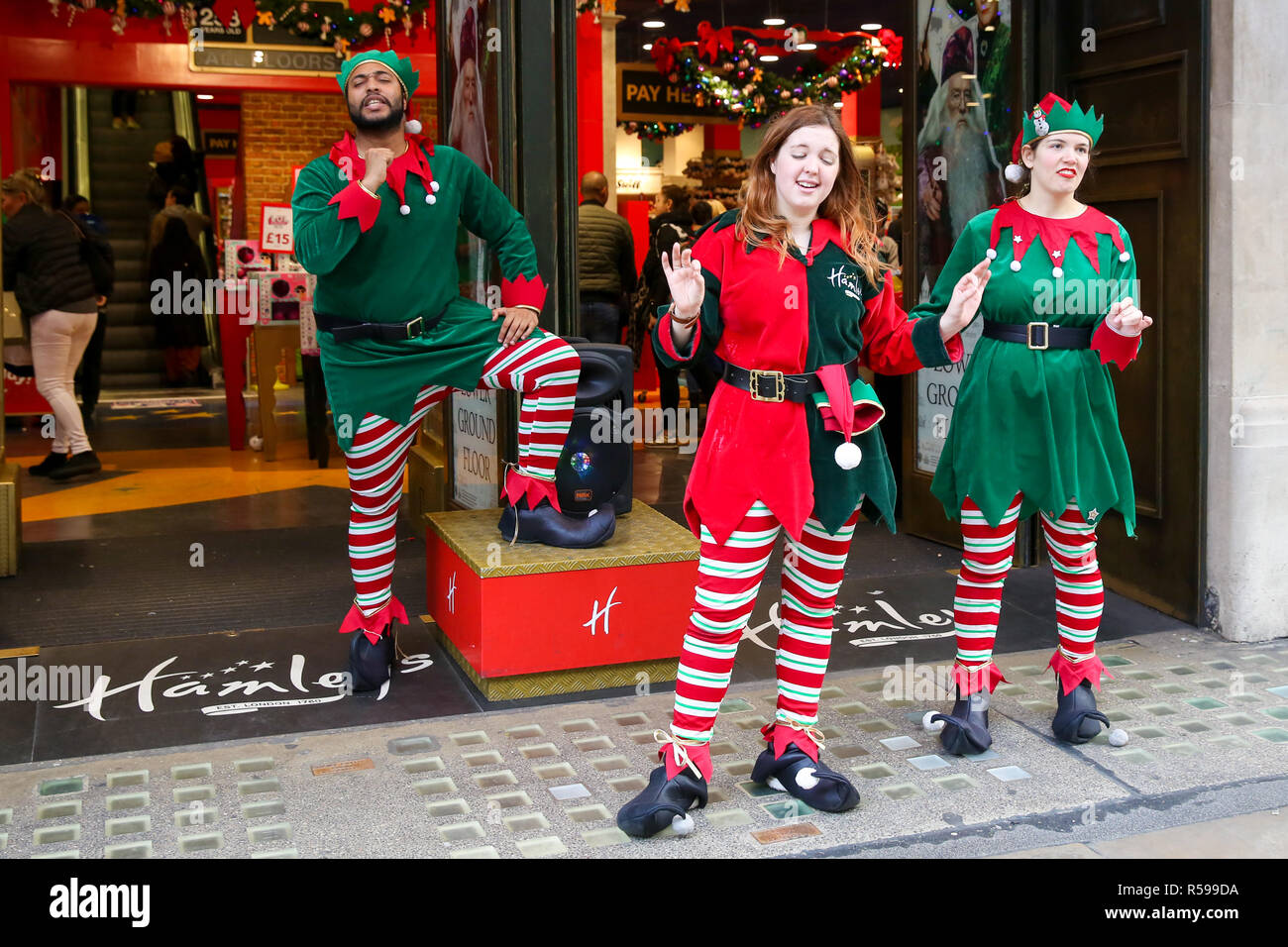Regents Street, London, UK. 30th Nov, 2018. Hamleys staff dressed as ...