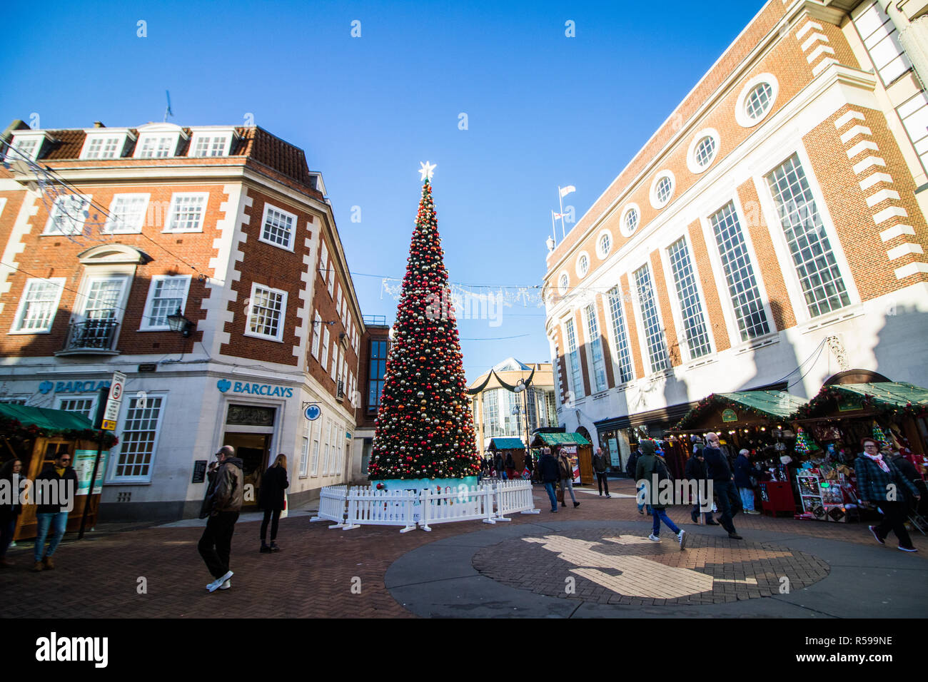 Kingston Surrey, UK. 30th November 2018. Shoppers walk past a tall ...