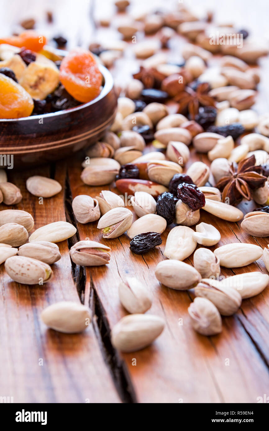 Mix of dried fruits and nuts in backlit Stock Photo - Alamy