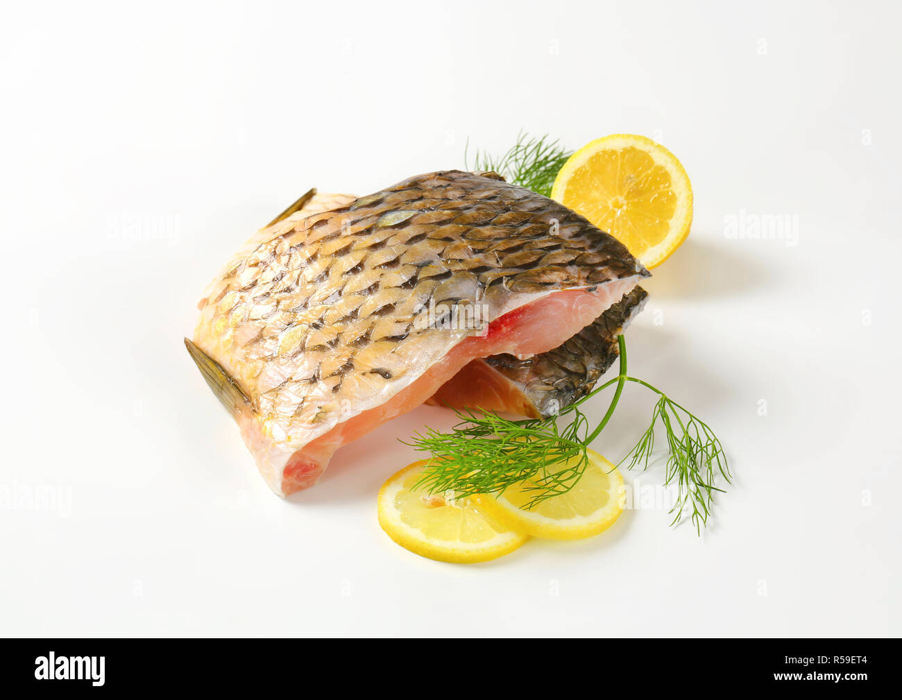 Raw carp fillets Stock Photo - Alamy
