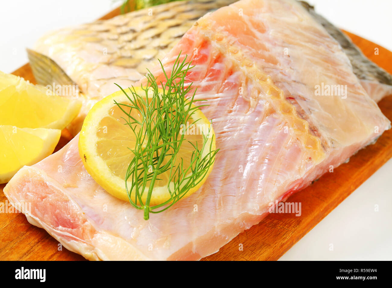Raw carp fillets Stock Photo - Alamy