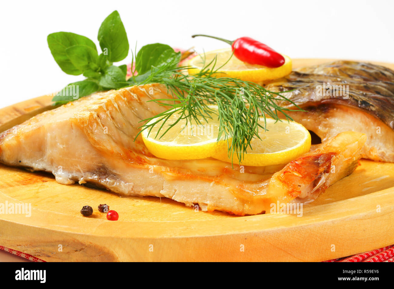 Oven baked carp fillets Stock Photo - Alamy