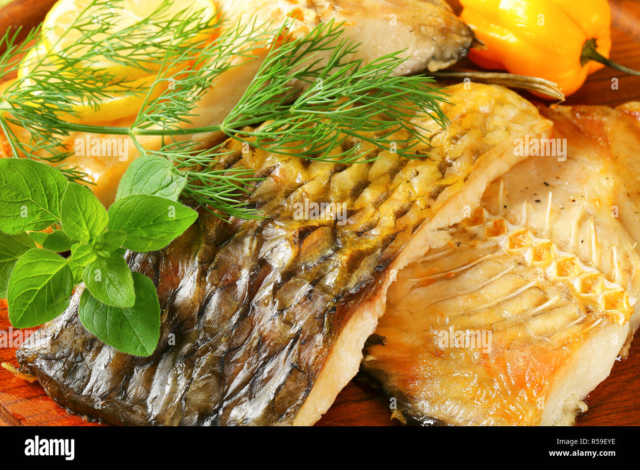 Oven baked carp fillets Stock Photo - Alamy