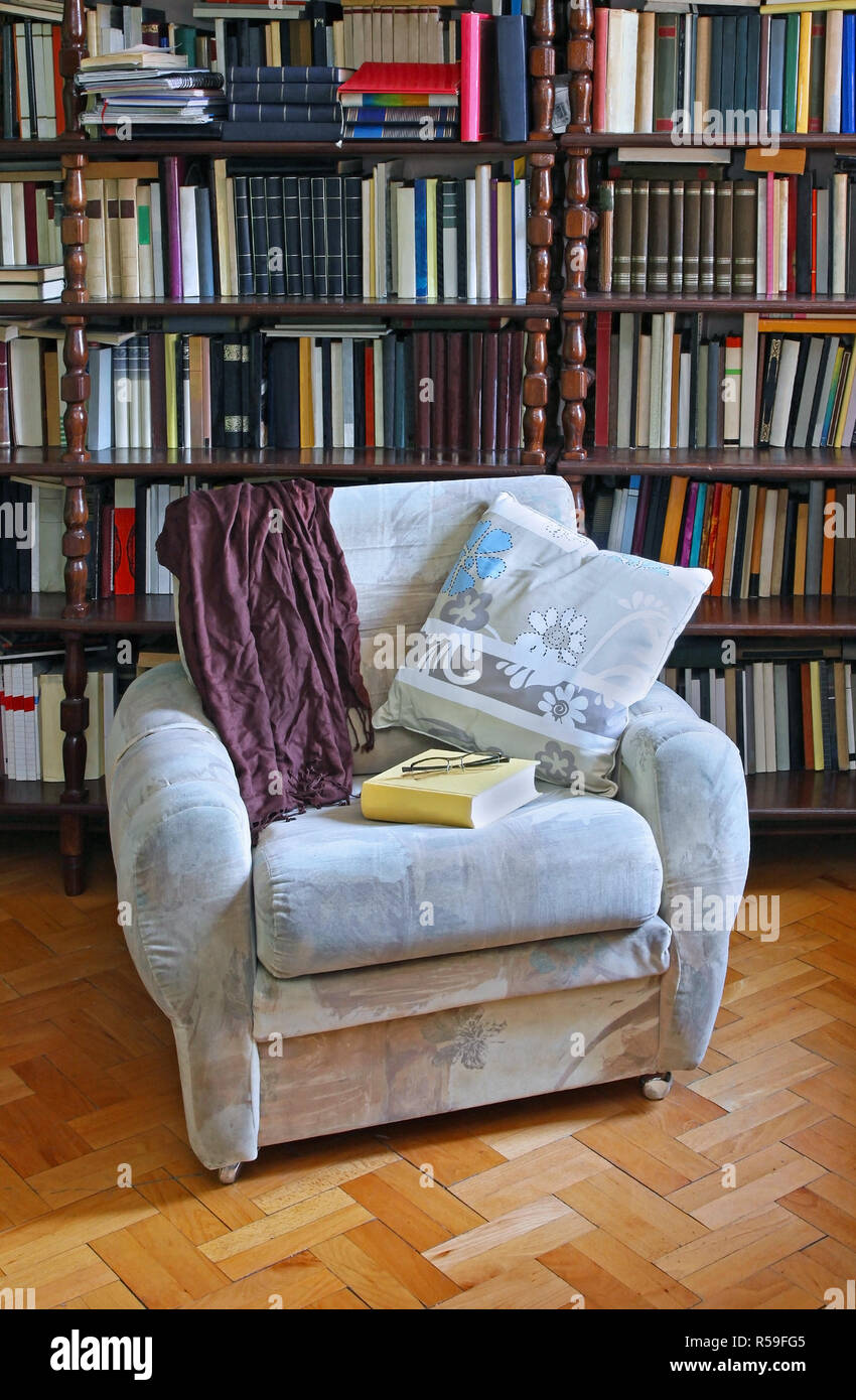 Home library armchair Stock Photo - Alamy