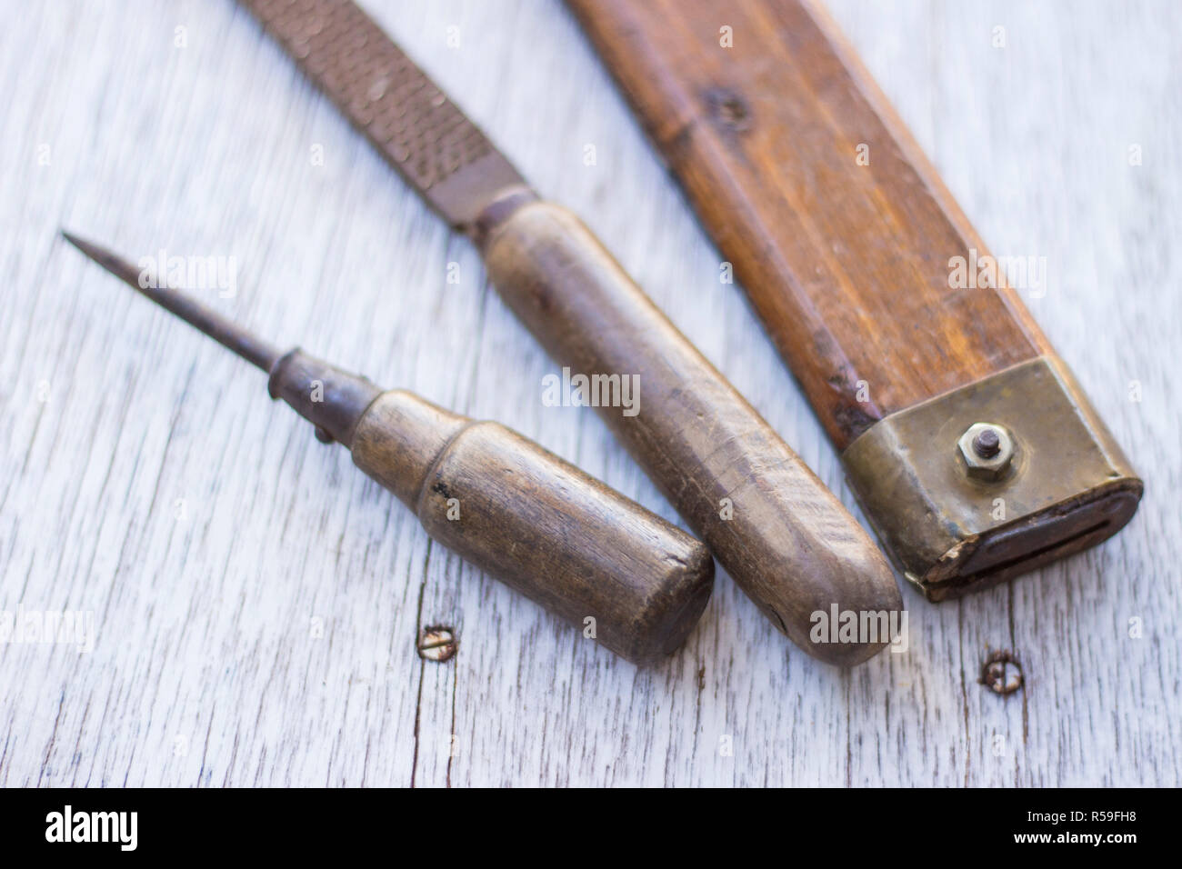 Carpentry tools, screwdriver, file and handsaw Stock Photo - Alamy