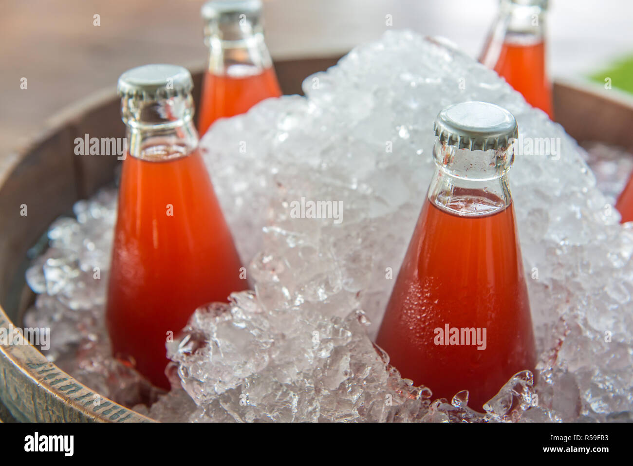 Strawberry juice bottle ice cold in the icebox Stock Photo - Alamy