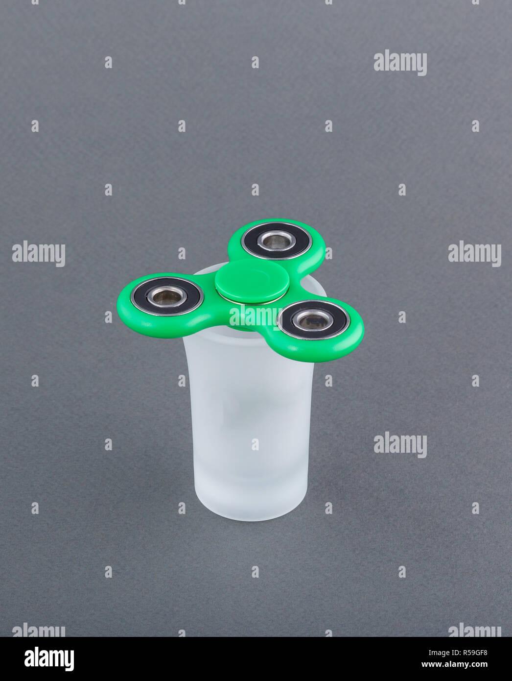 Child playing with fidget spinner hi-res stock photography and images ...