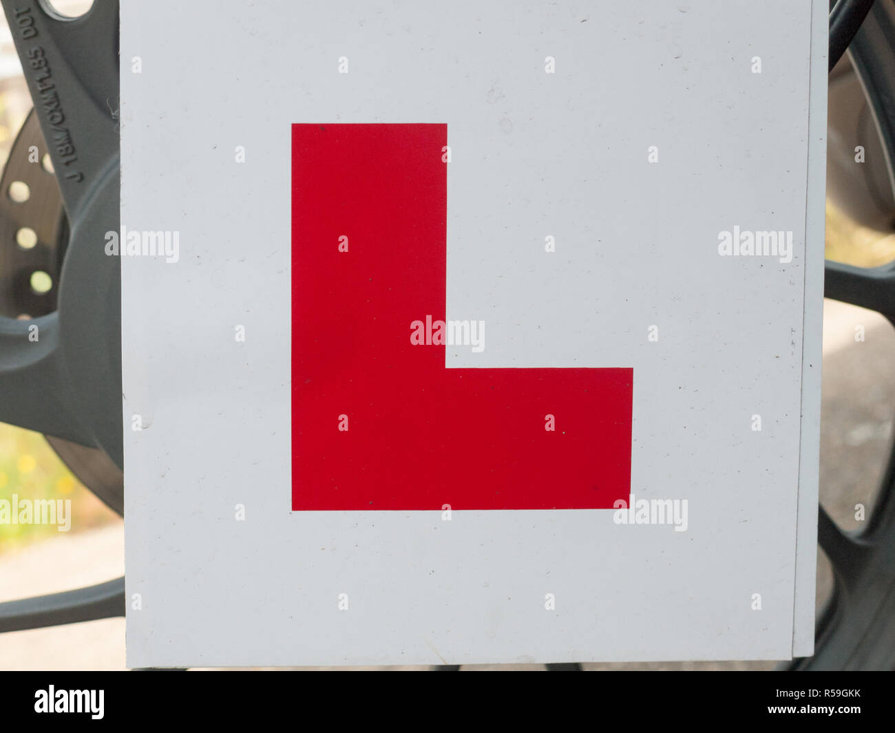 Big red L on White background learner's driving sign Stock Photo - Alamy