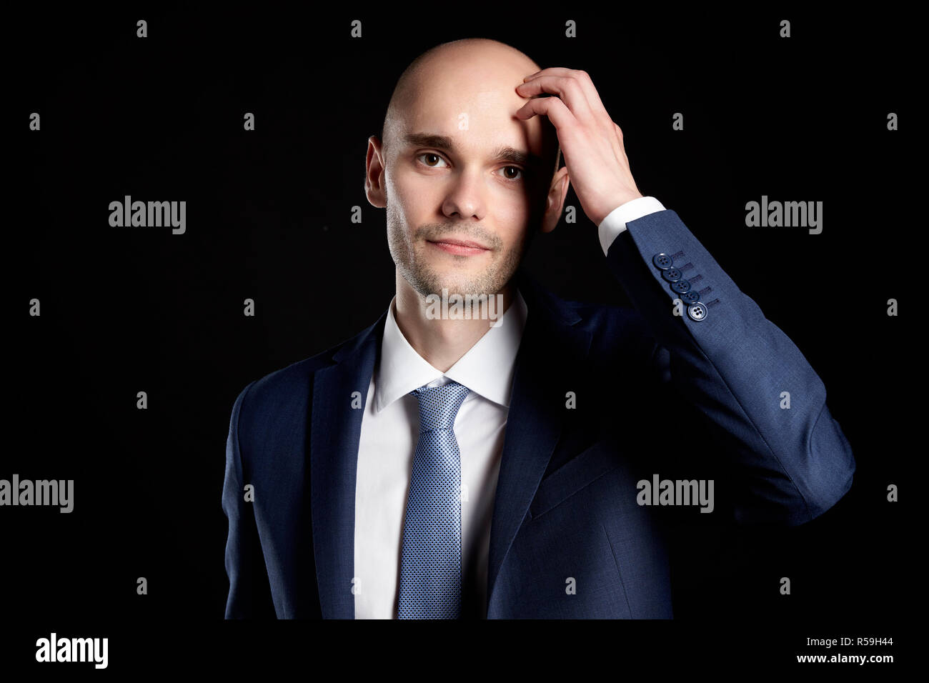 Office worker scratching head hi-res stock photography and images - Alamy