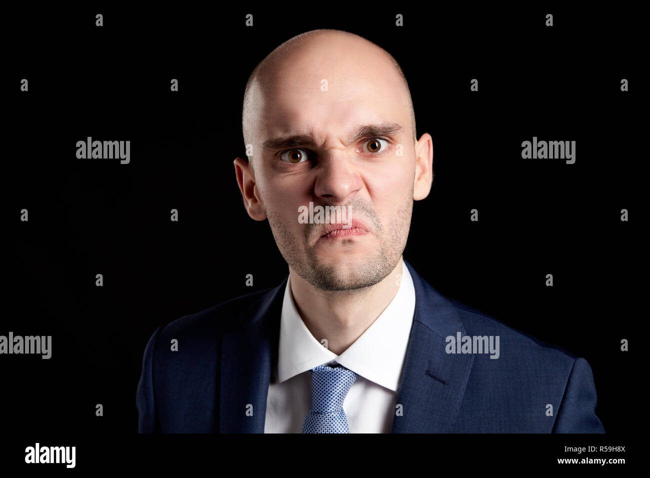 Bald Angry Man Stock Photo - Alamy