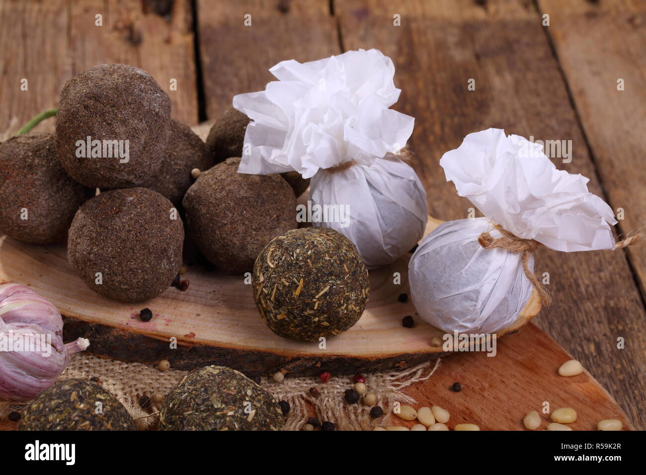 Shanklish and belper cheeses on a wooden table Stock Photo - Alamy