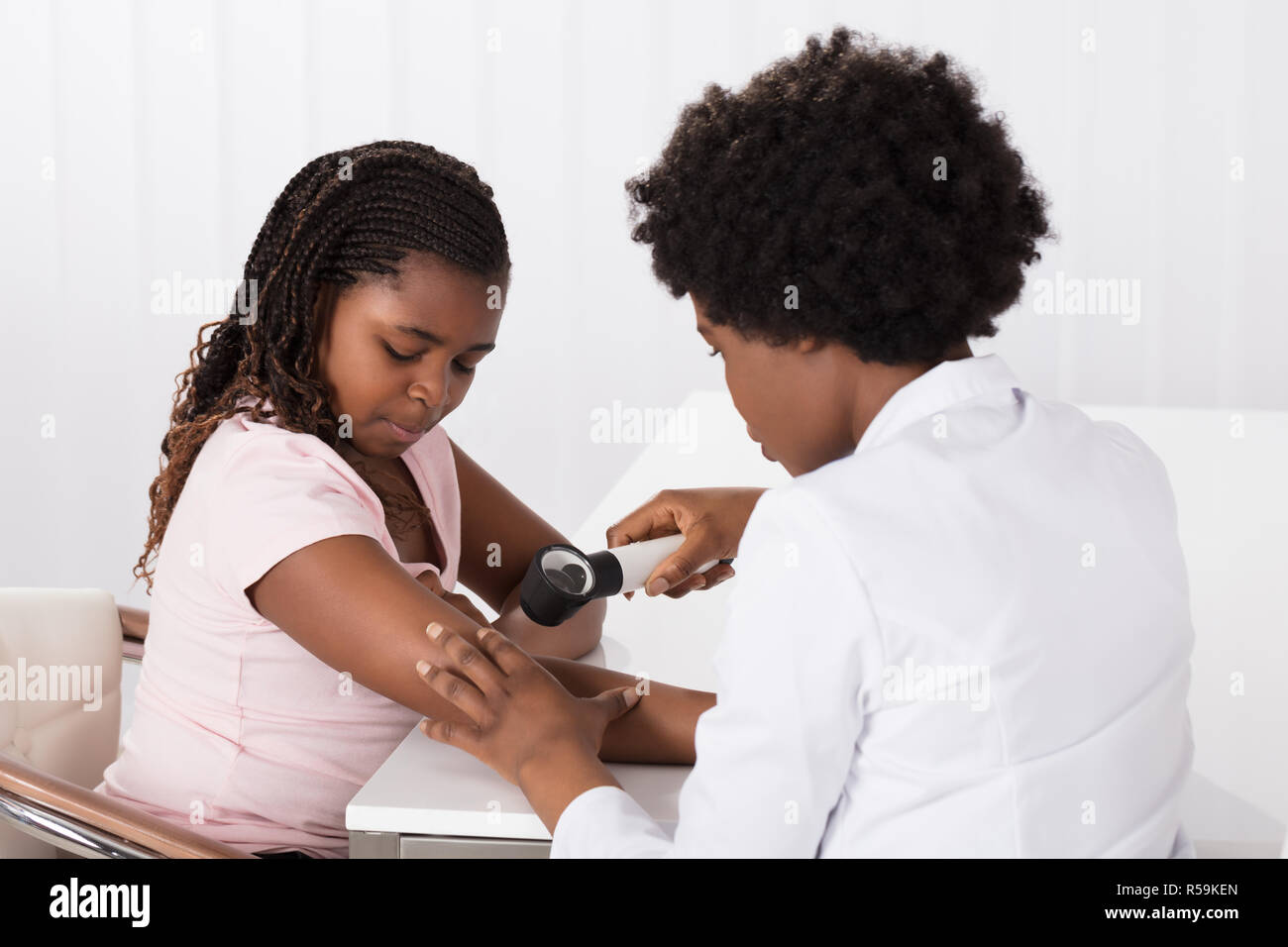 Dermatologist Checking The Child Patient Skin Stock Photo - Alamy