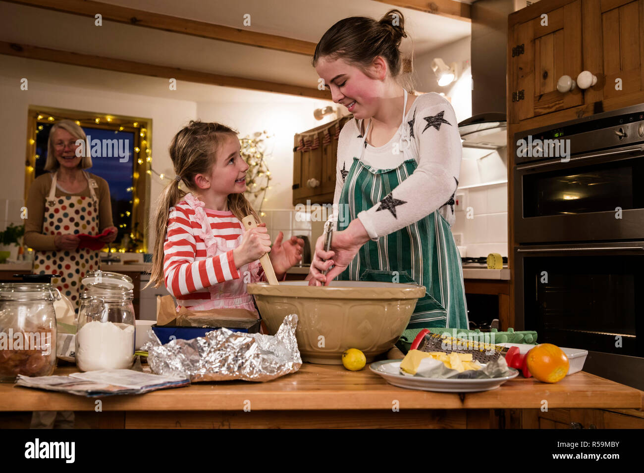 Grandma Grandchild Baking Cake High Resolution Stock Photography and ...