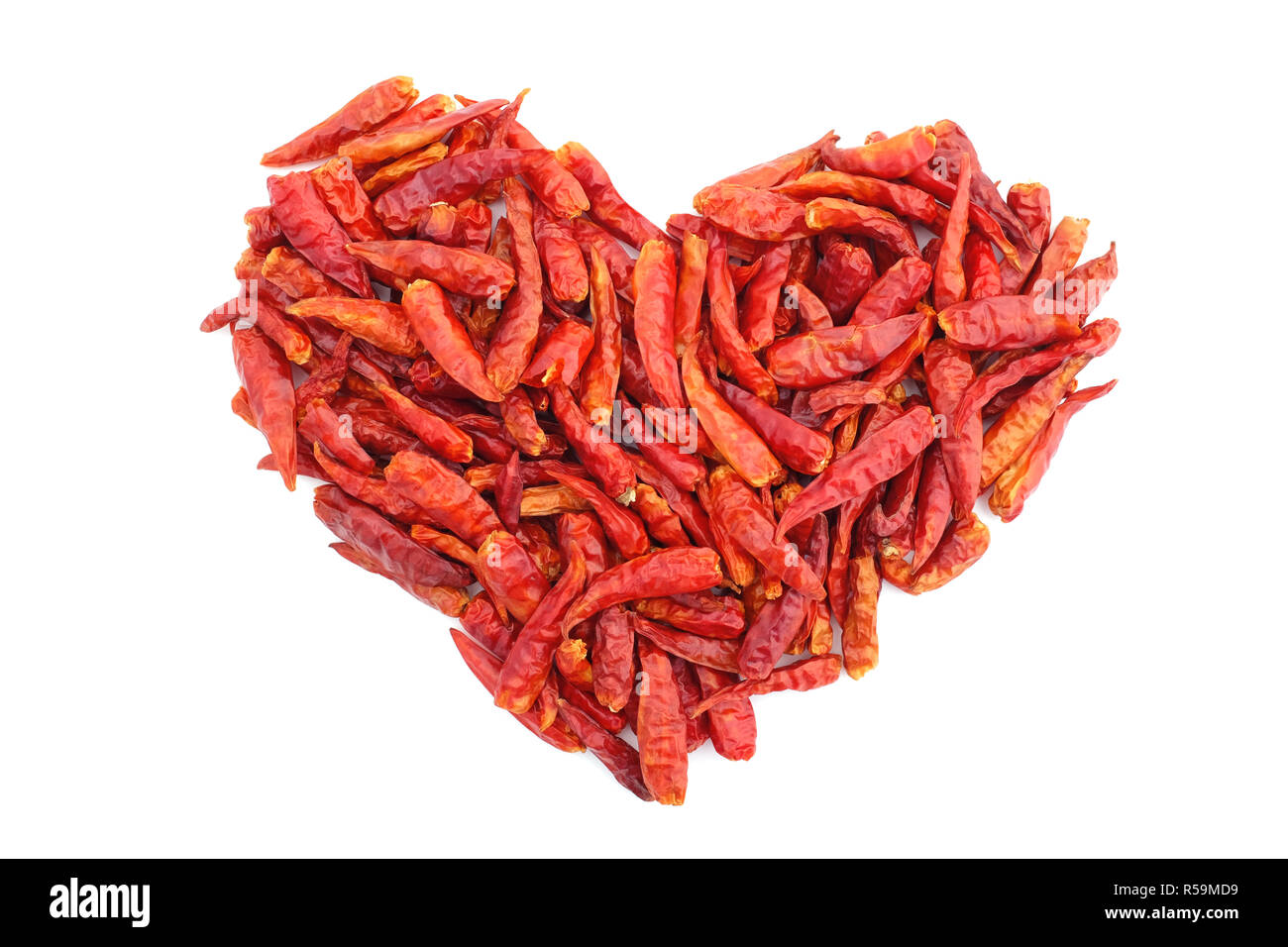 Spicy red birds eye chilli peppers in a heart shape Stock Photo - Alamy