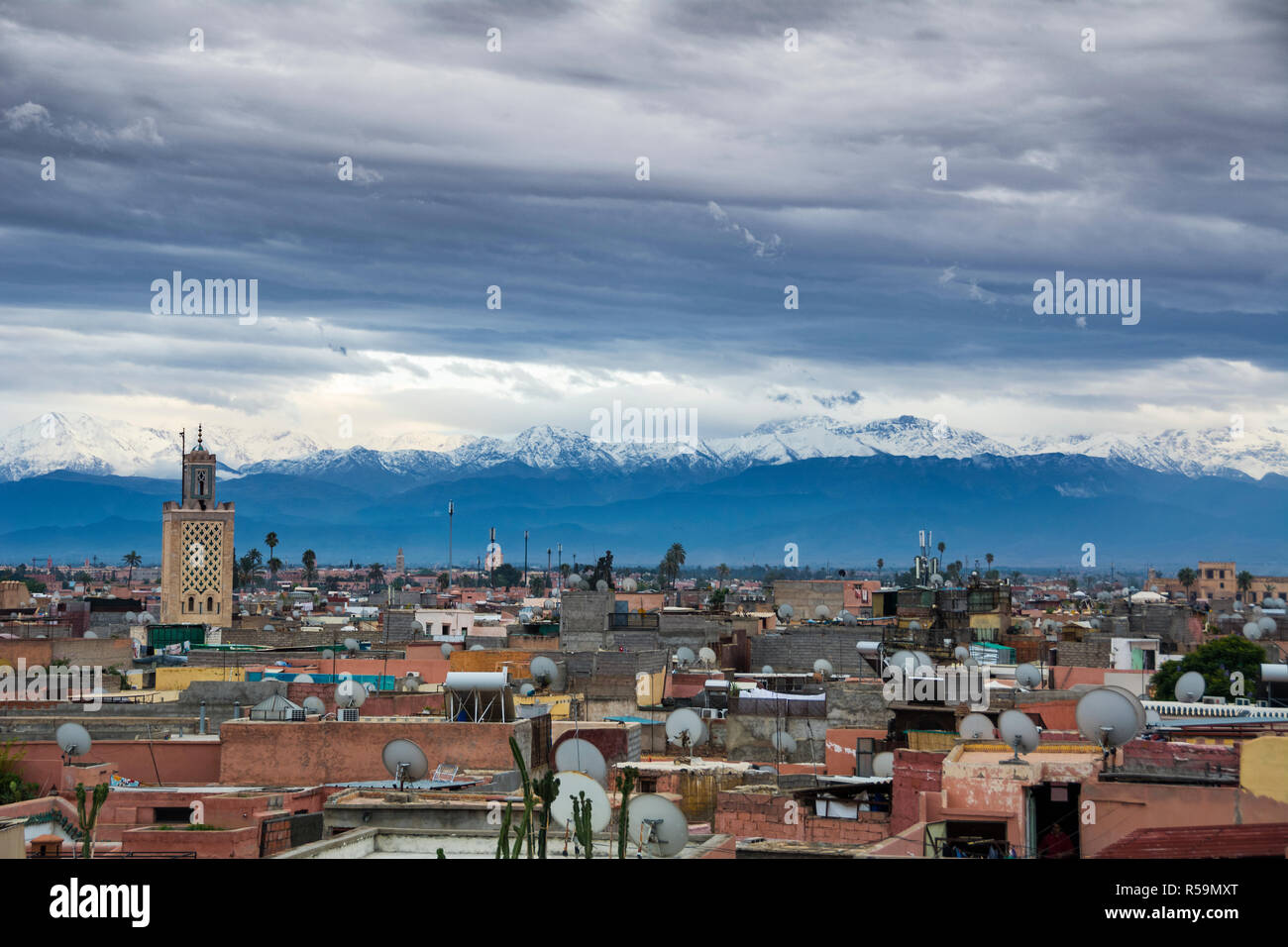 Marrakesh city skyline with backdrop of Atlas mountains Stock Photo - Alamy