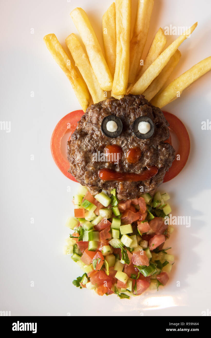 Funny meat cutlet face Stock Photo - Alamy