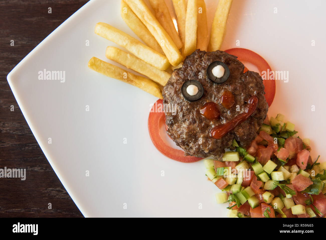 Funny meat cutlet face Stock Photo - Alamy