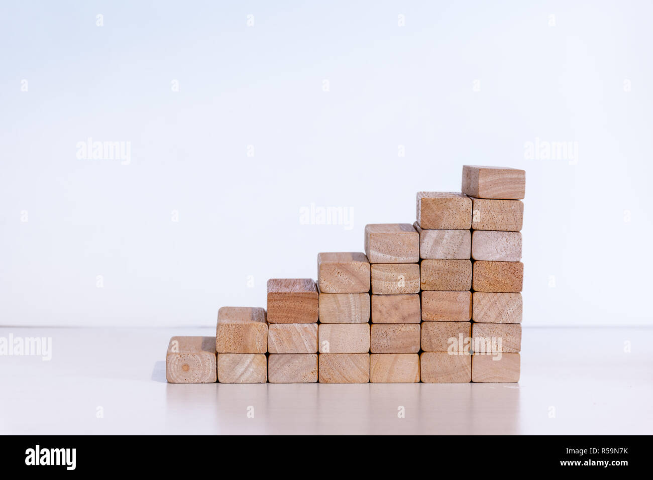 Steps on a stairs made of wooden blocks Stock Photo - Alamy