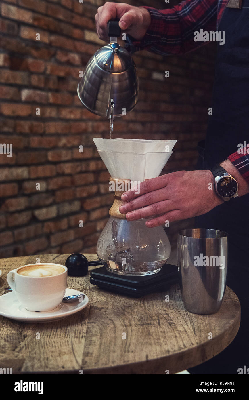 Barista brewing coffee Stock Photo - Alamy