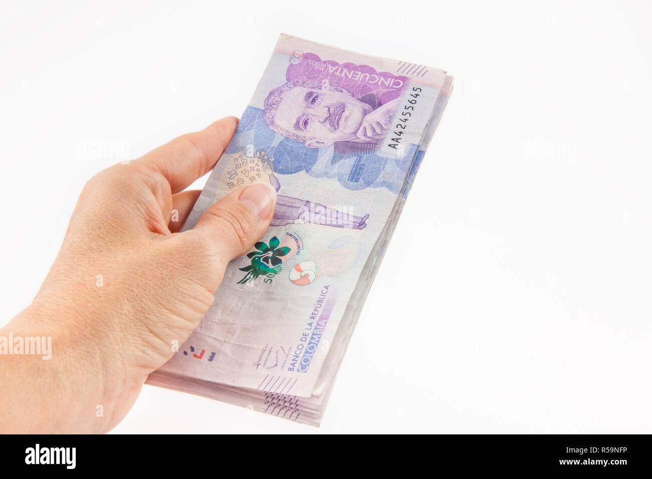 Woman handling money Stock Photo - Alamy