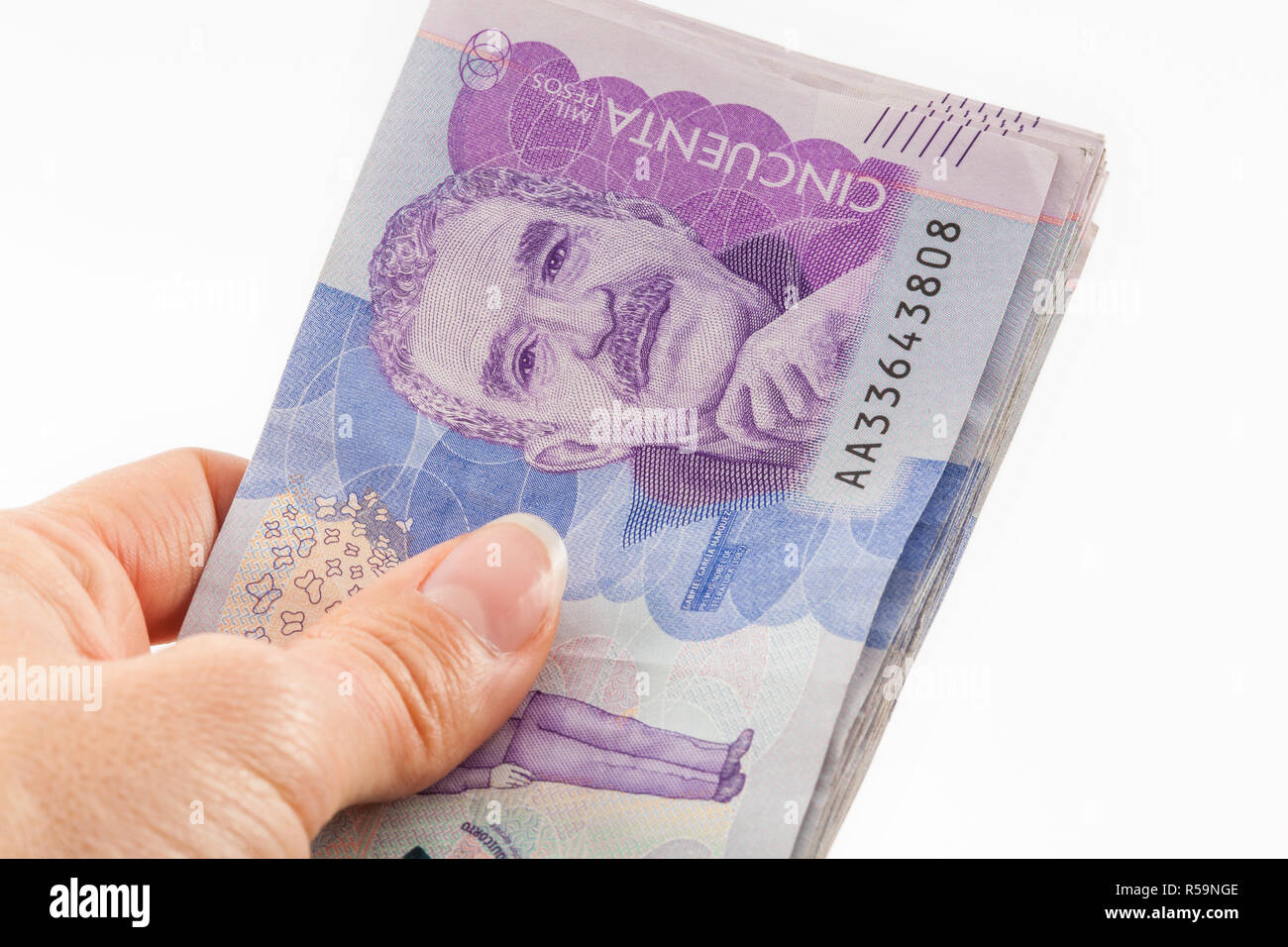 Woman handling money Stock Photo - Alamy