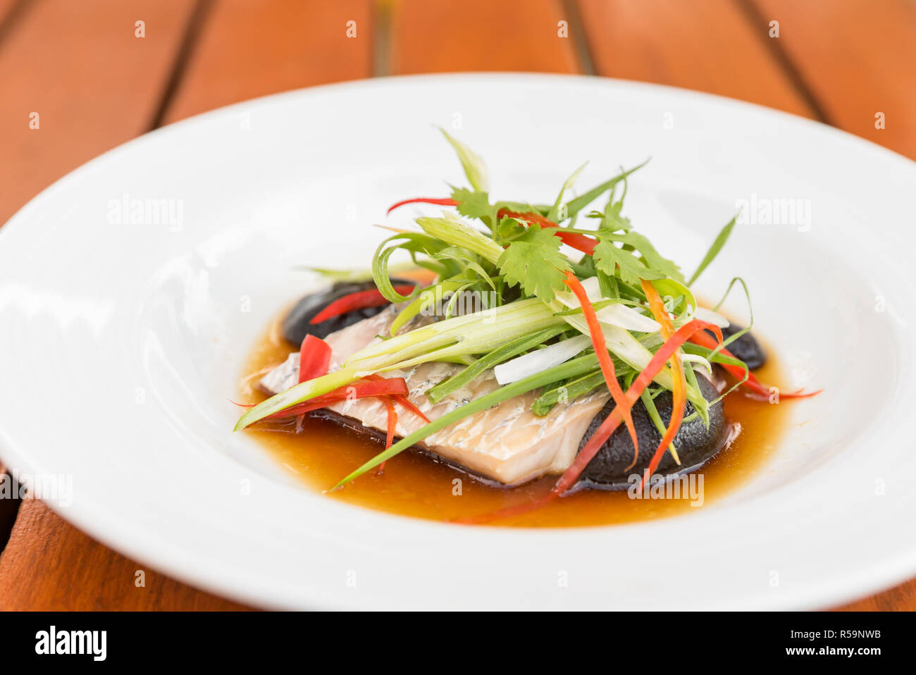 Steamed sea bass fillet Stock Photo - Alamy