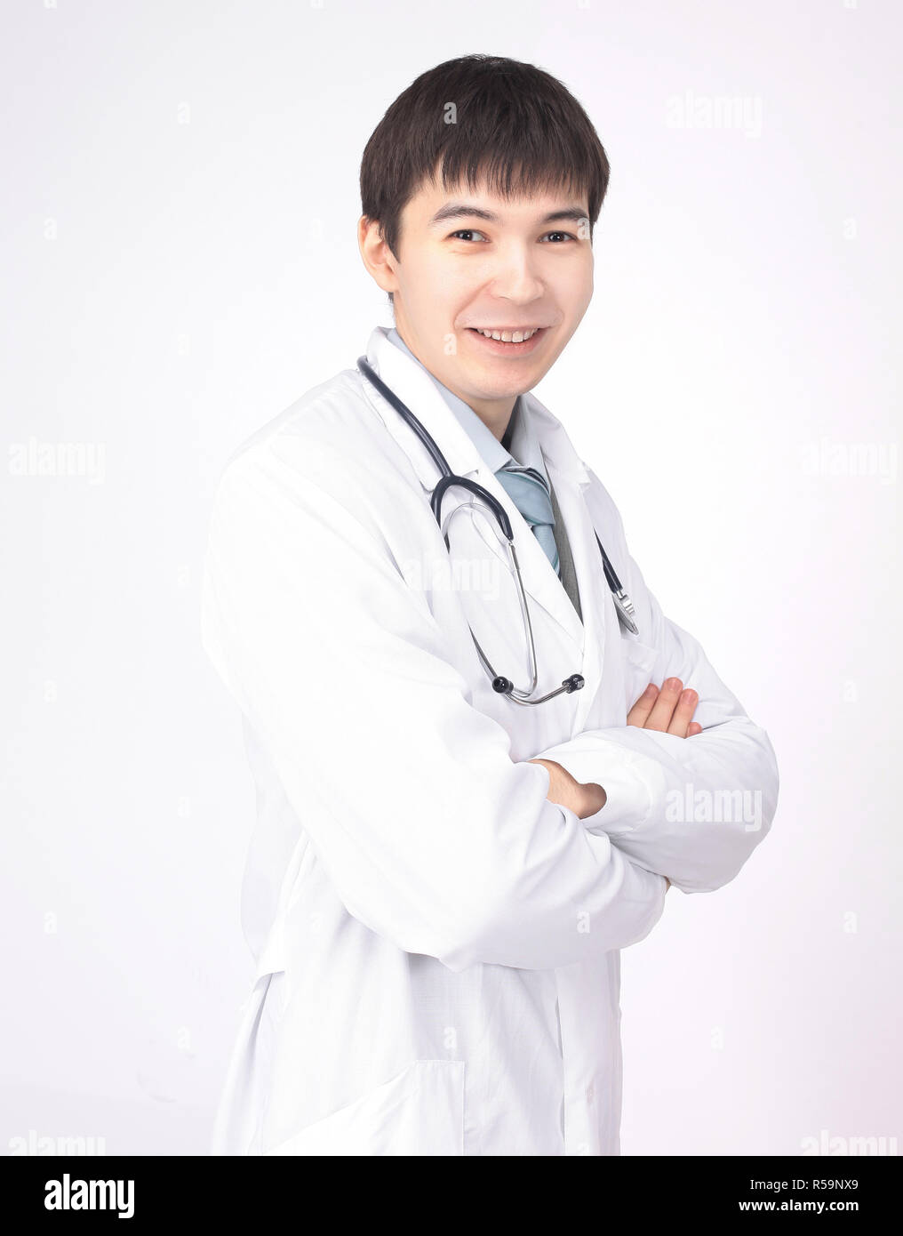 portrait of young doctor with Asian appearance isolated on white ...