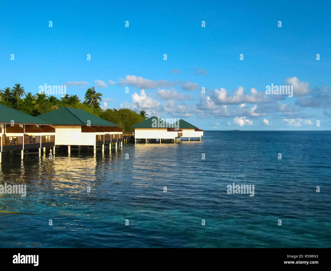 Over water bungalows and the blue sea Stock Photo - Alamy