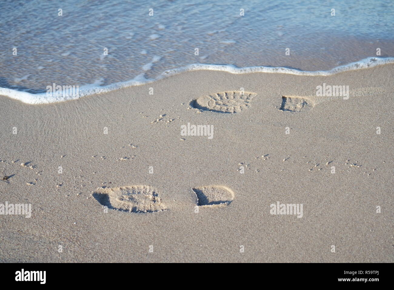 shoe marks in the sand Stock Photo - Alamy
