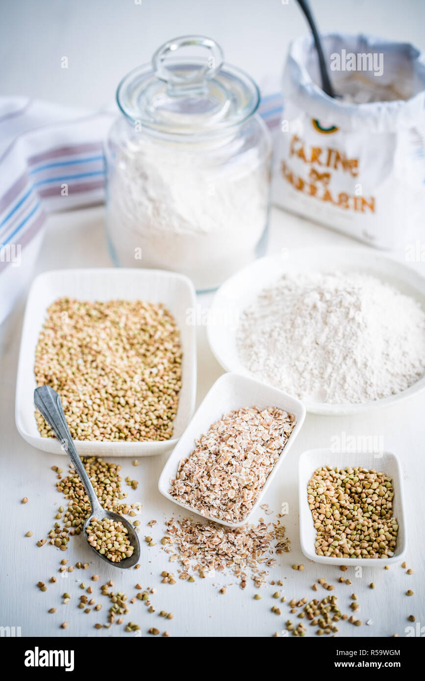 Buckwheat flour, grains and flakes Stock Photo - Alamy