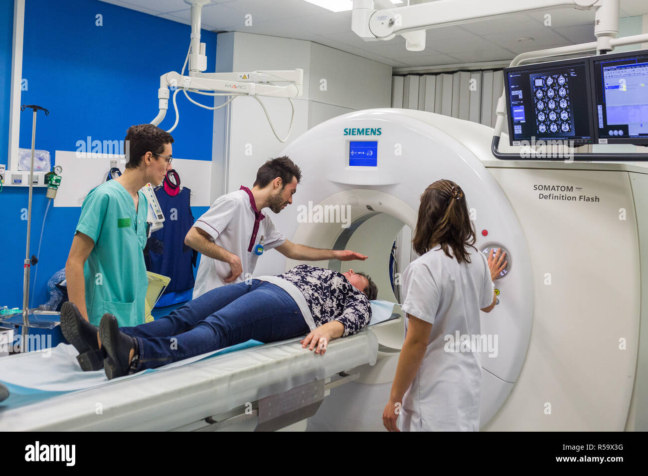 Patient undergoing a flash CT Scan, Angouleme hospital, France Stock ...