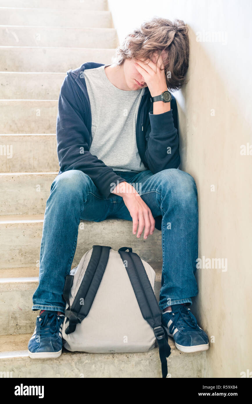 Depressed teenage boy Stock Photo - Alamy