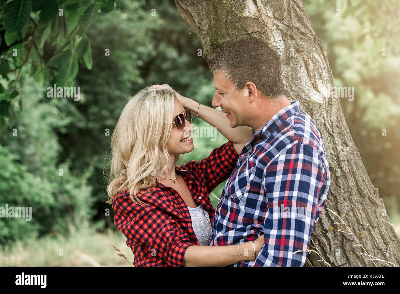 young laughing woman with his happy boyfriend Stock Photo - Alamy