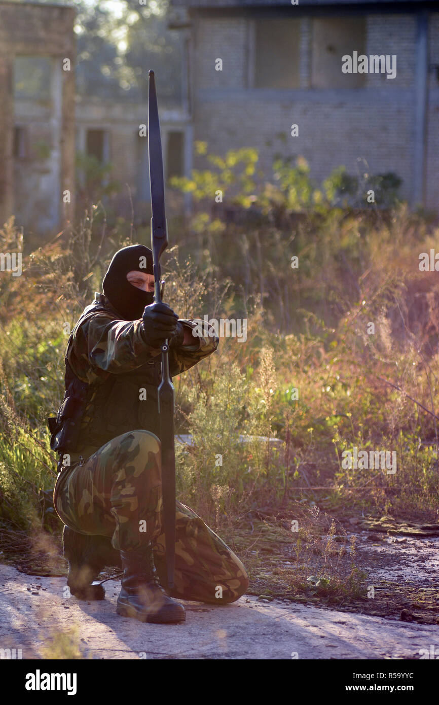 soldier with bow and arrow Stock Photo - Alamy