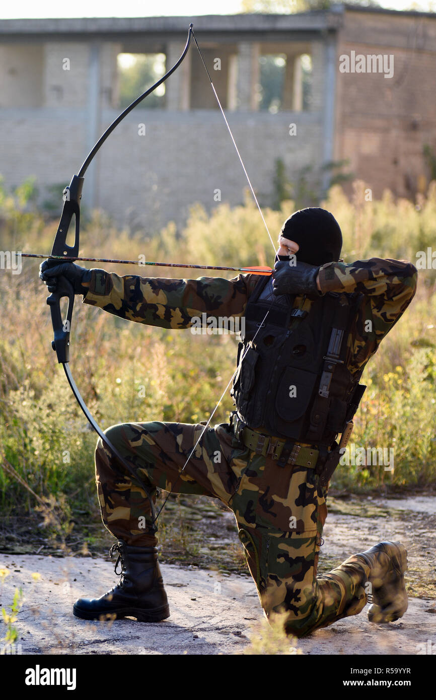 soldier with bow and arrow Stock Photo - Alamy