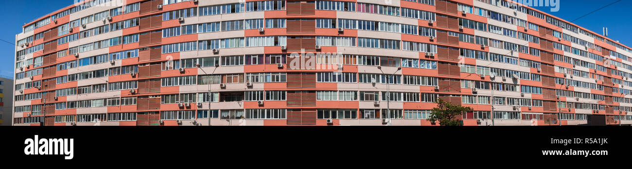 Apartment building brightly painted in Bucharest, Romania Stock Photo ...