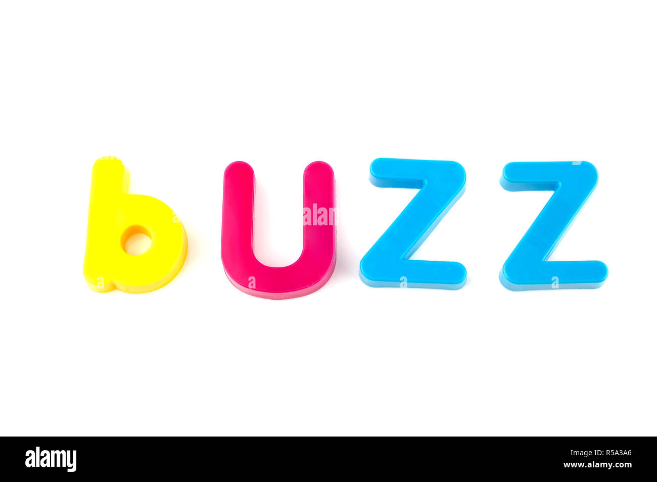 Word Buzz From Plastic Toys Letters Stock Photo - Alamy