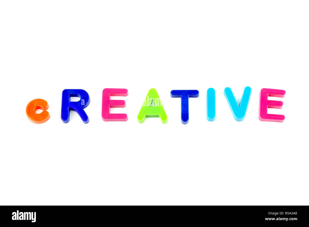 Word Creative From Plastic Toys Letters Stock Photo - Alamy