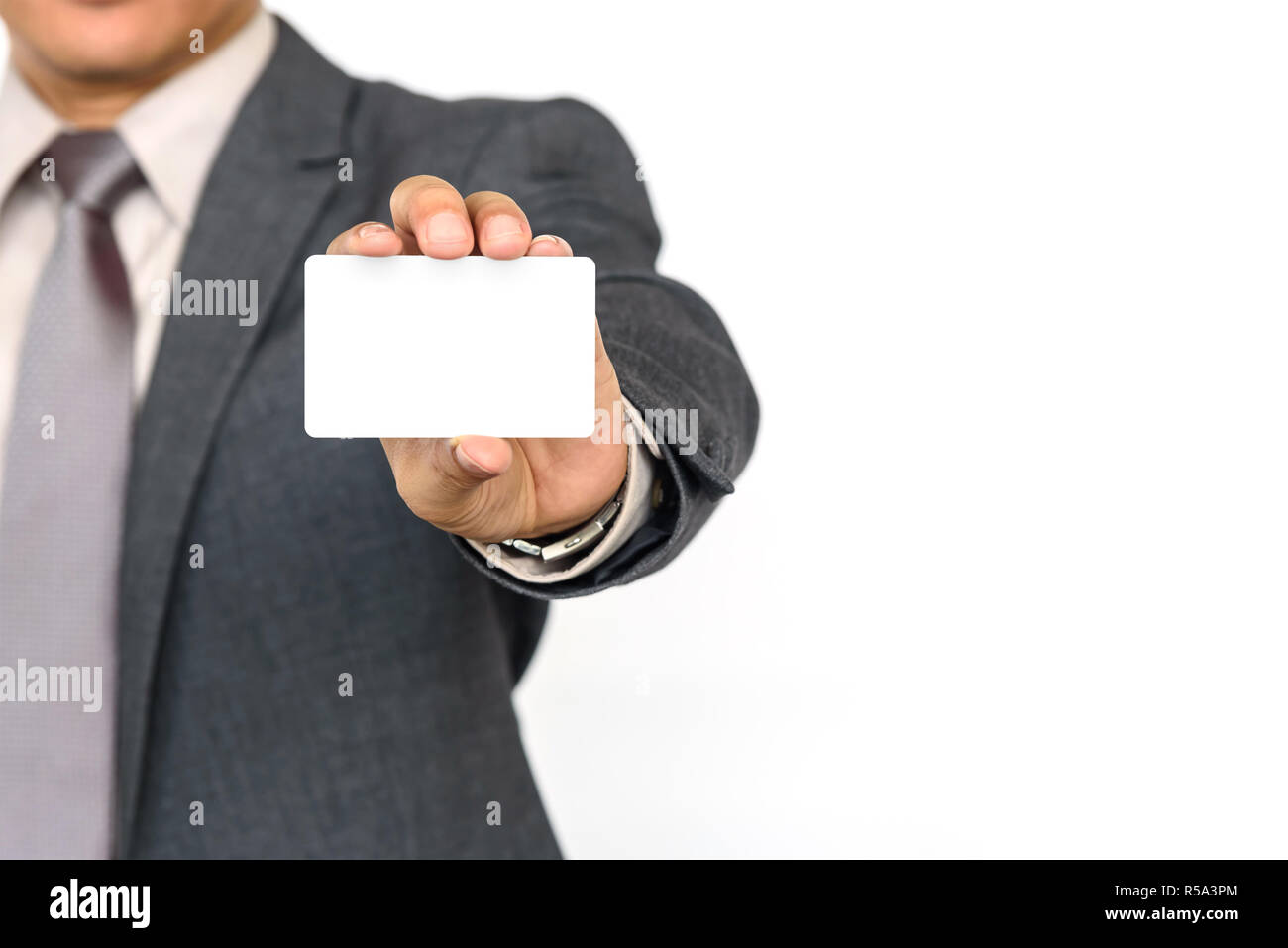 A businessman holding a white blank business name card Stock Photo - Alamy