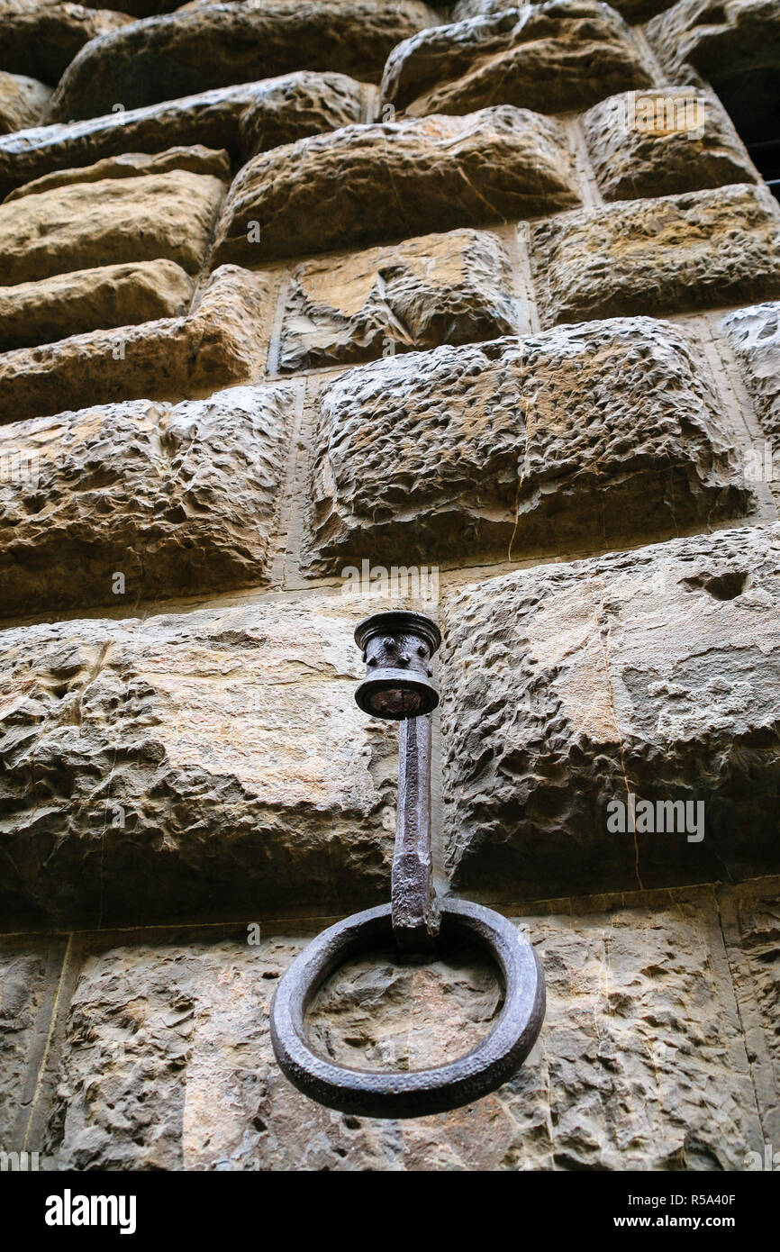 ring of hitching post on wall of medieval house Stock Photo - Alamy
