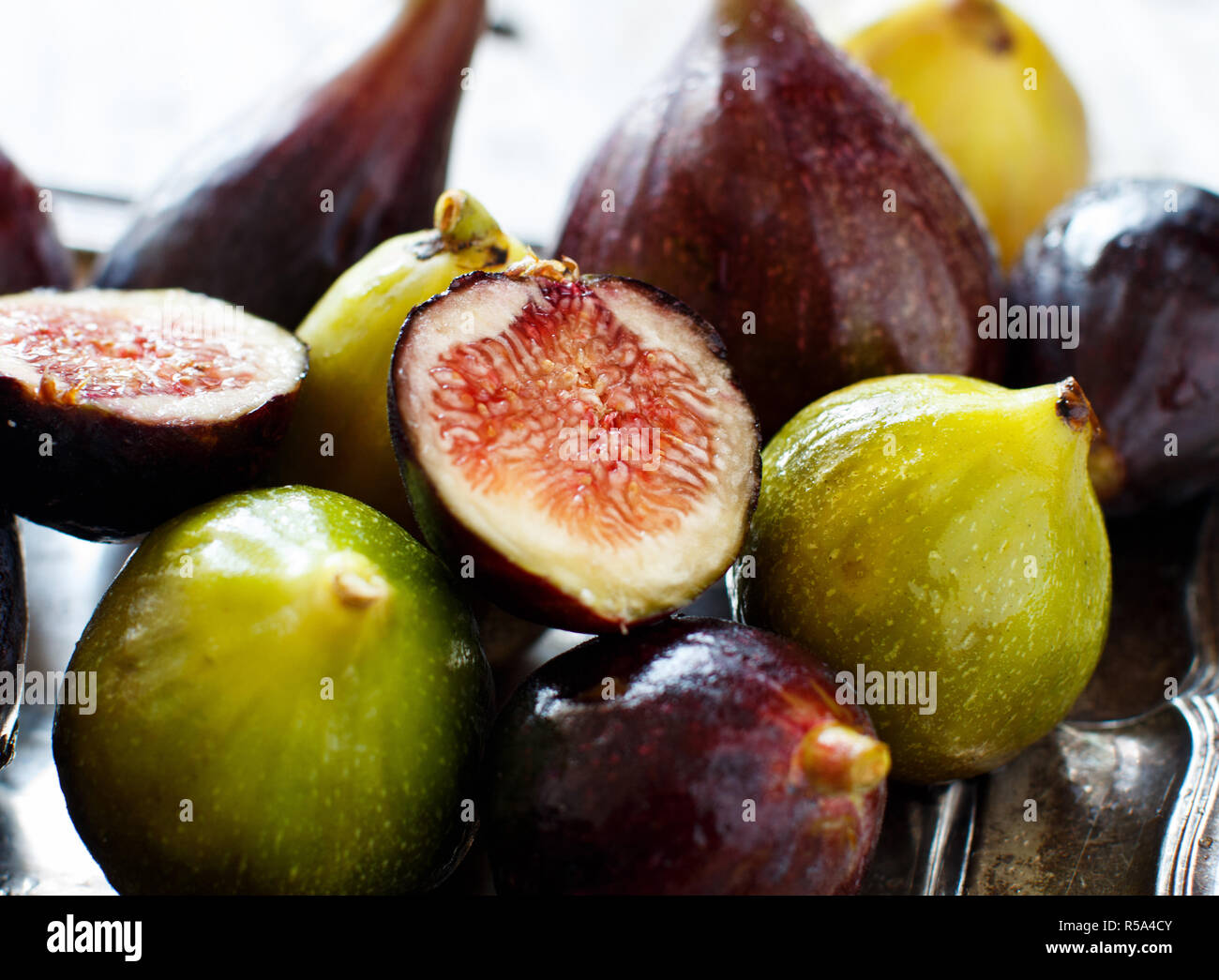 Green and purple figs Stock Photo - Alamy