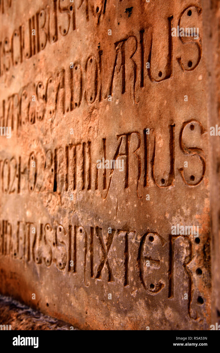 antiquated letters carved in stone Stock Photo - Alamy