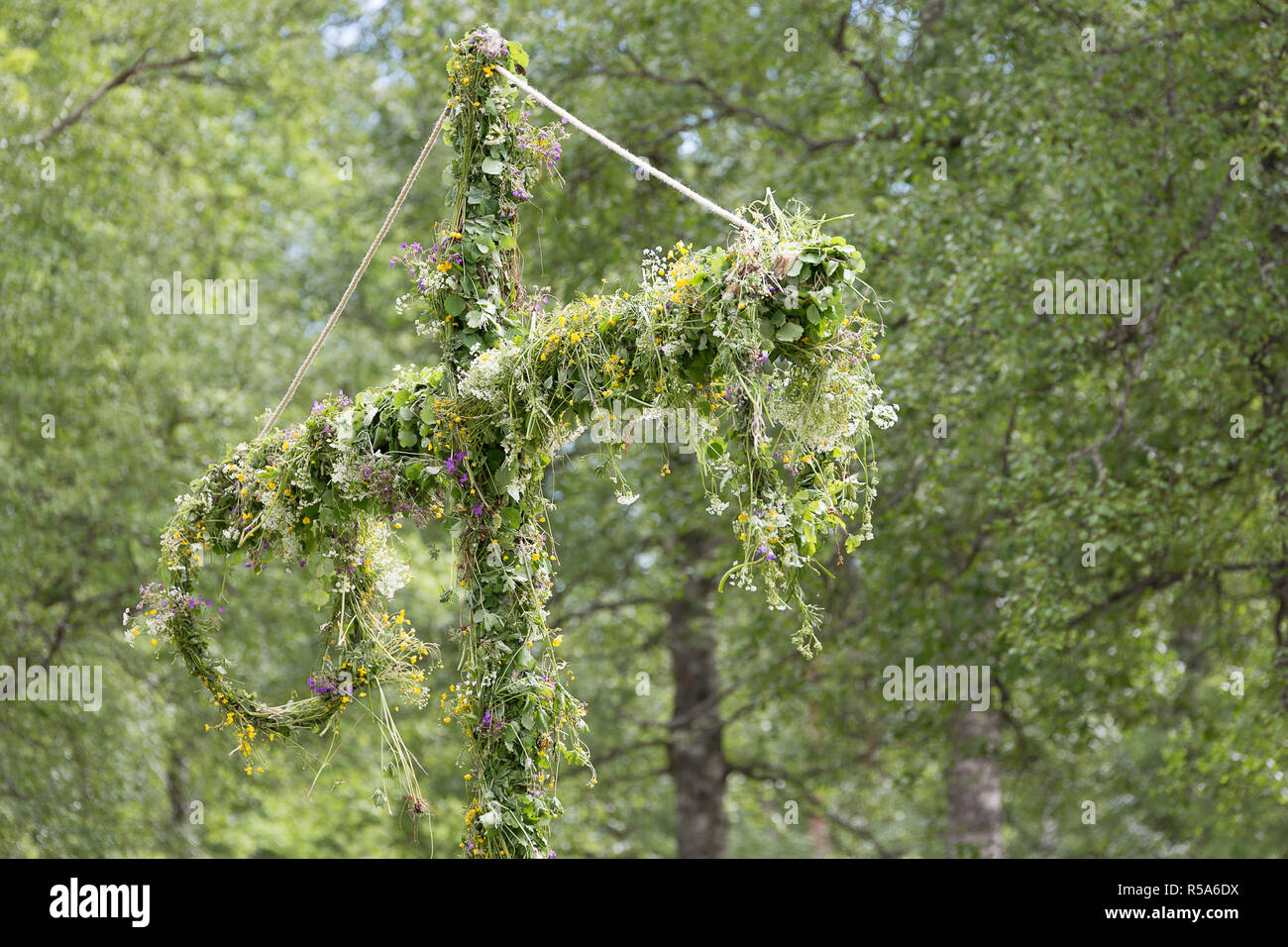 Swedish Maypole Covered in Flowers Stock Photo - Alamy